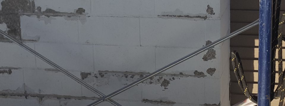 Re-surfacing damaged cinder block chimney | Willamette Chimney